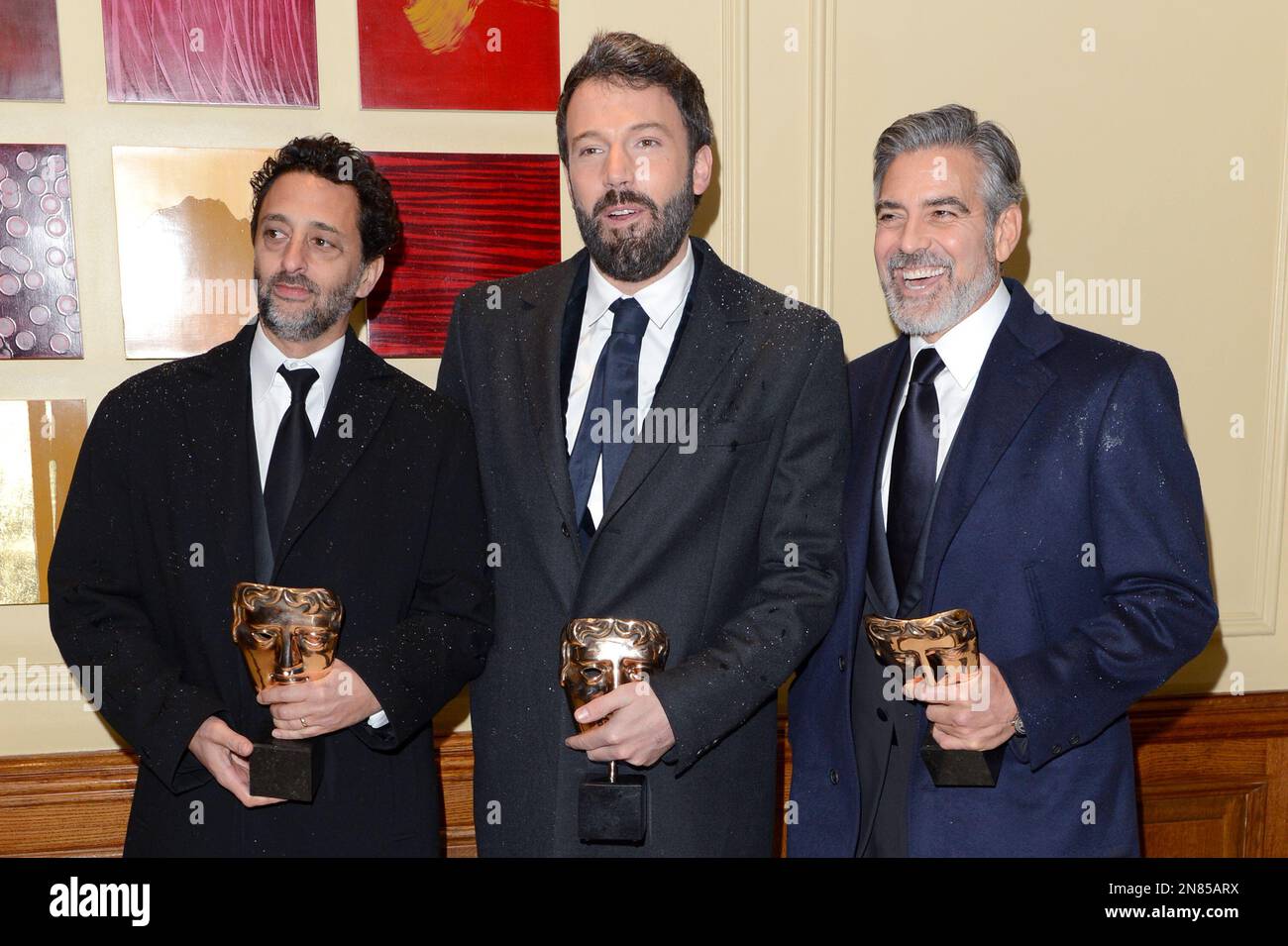 From left, Ben Affleck, Grant Heslov and George Clooney seen arriving ...