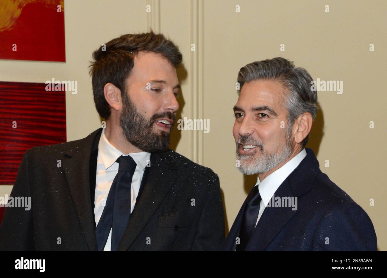 Ben Affleck, left, and George Clooney seen arriving for the BAFTA Film ...