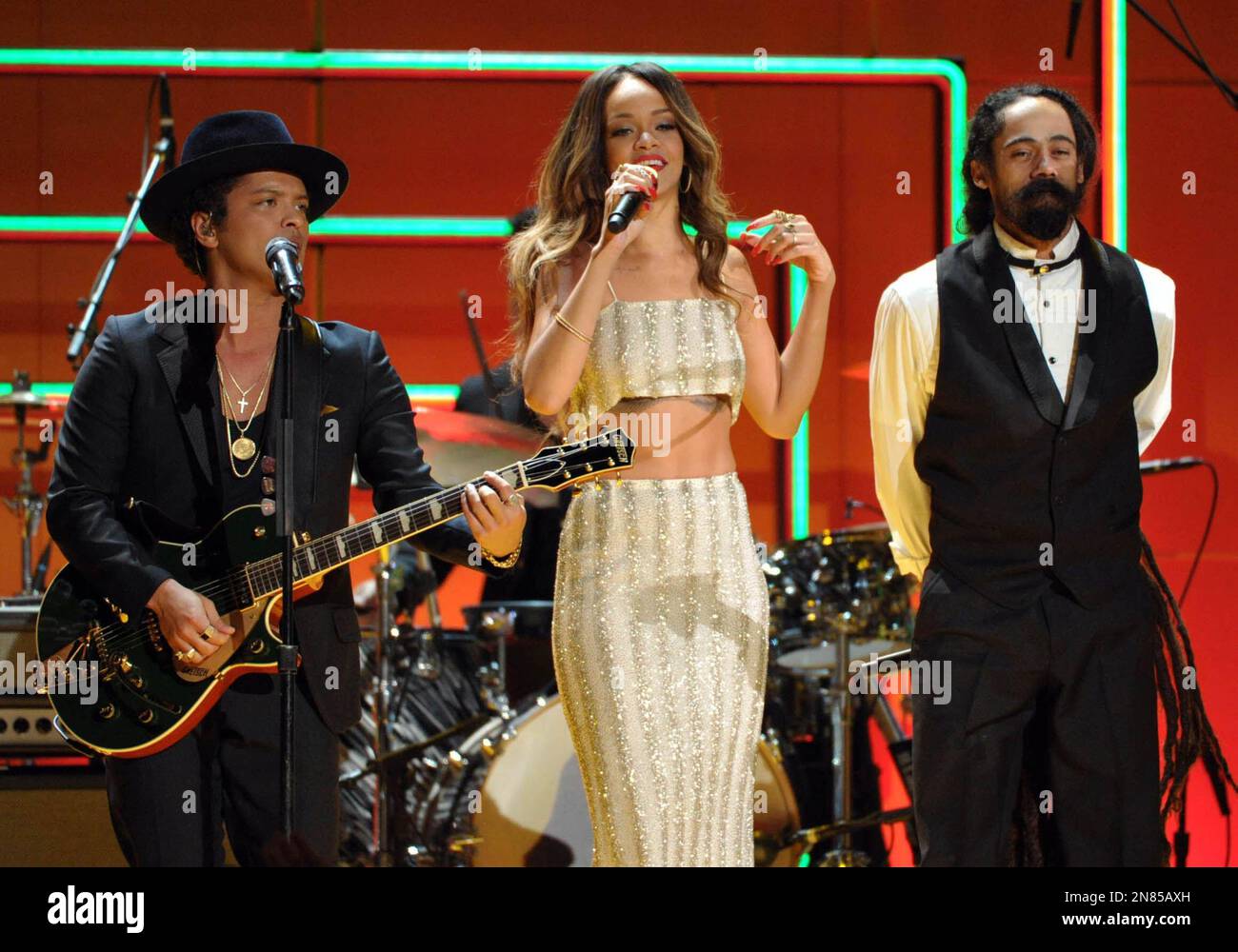 Recording artists Bruno Mars, left, Rihanna , center, and Damian Marley ...
