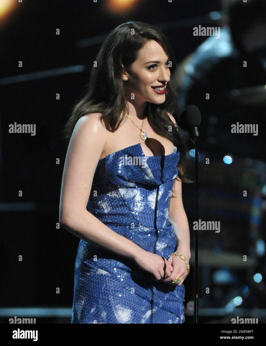 Kat Dennings speaks onstage at the 55th annual Grammy Awards on Sunday ...