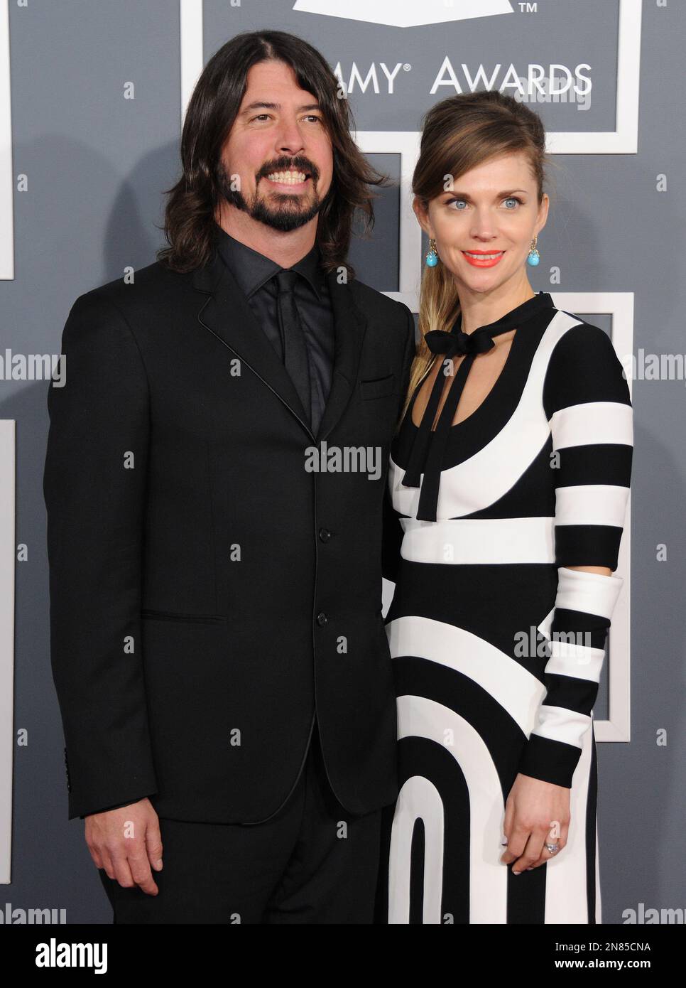 David Grohl, left, and Jordyn Blum arrives at the 55th annual Grammy ...