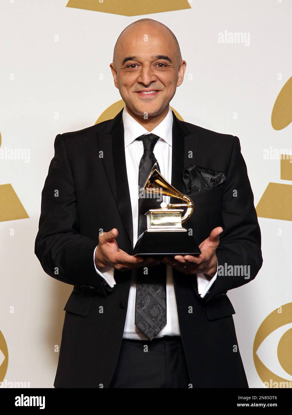 Omar Akram poses backstage with the best new age album award for "Echoes of Love" at the 55th ...
