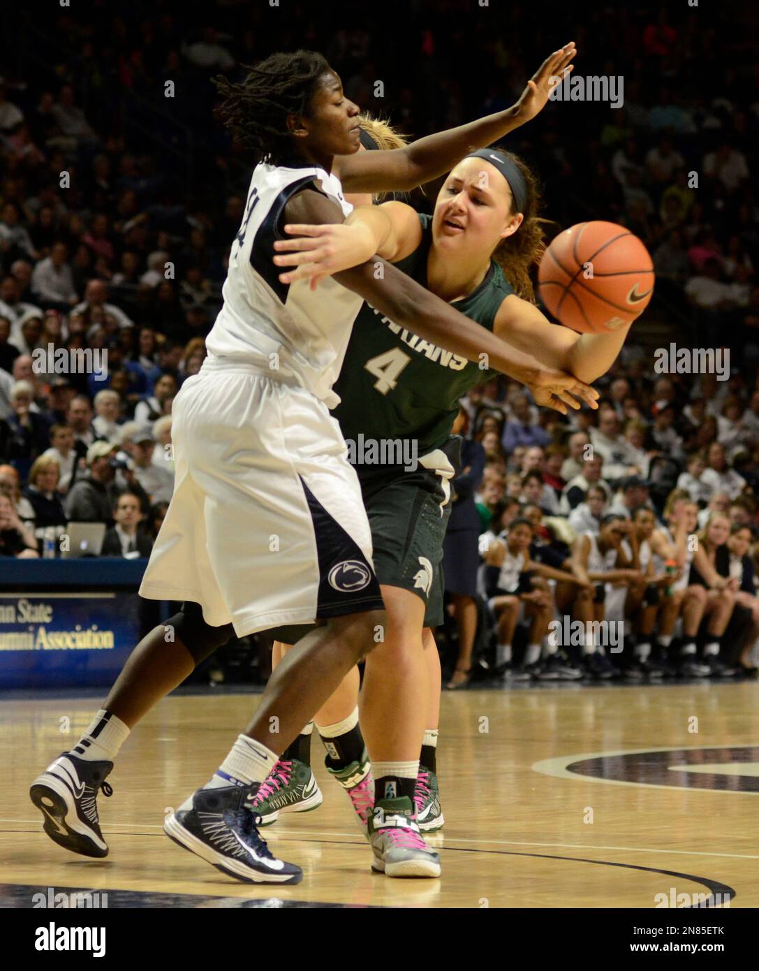 Penn State's Nikki Greene, left, tries to block a pass by Michigan ...