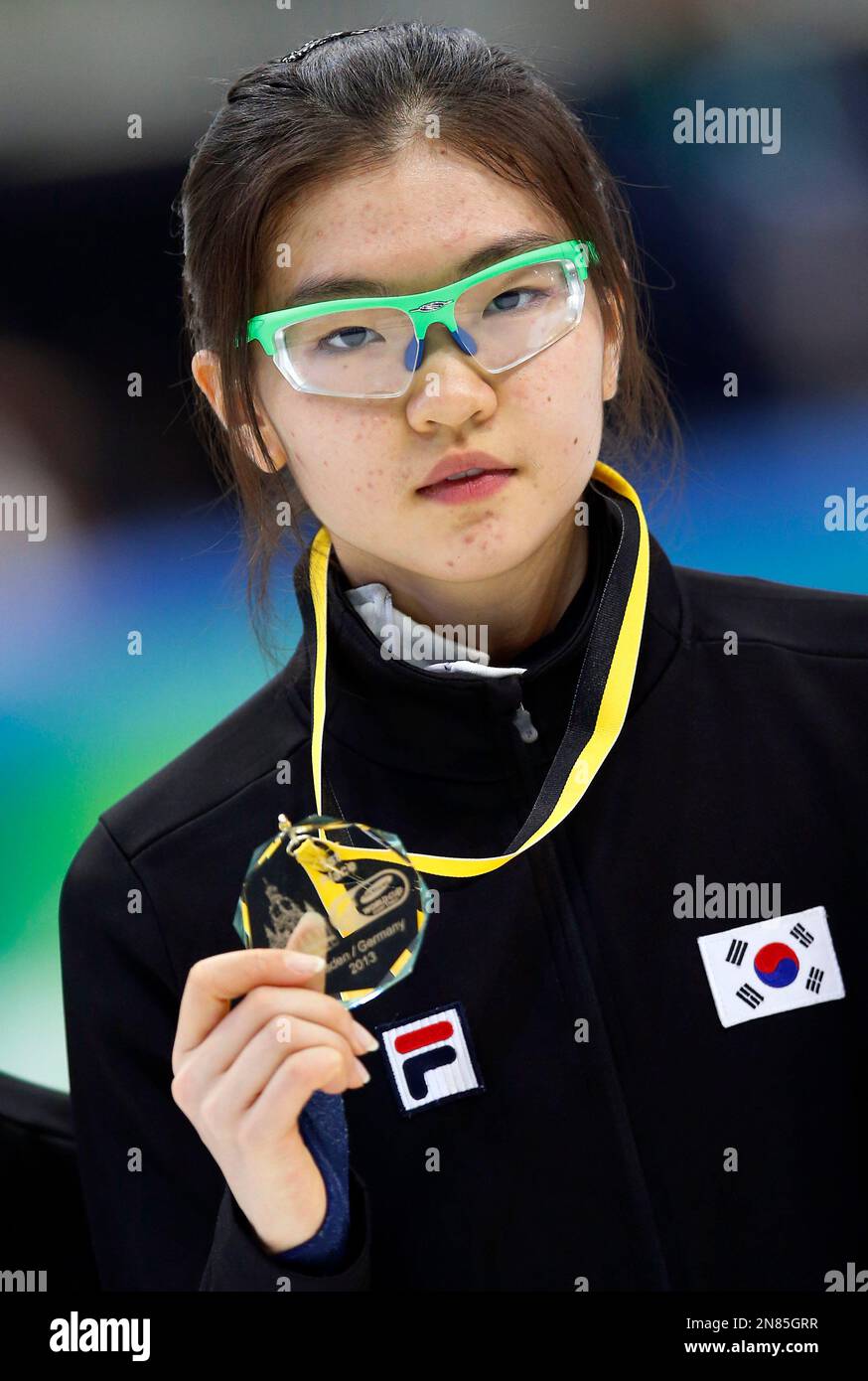 Koreas's gold medalist Shim Suk-hee poses with her medal during the ...