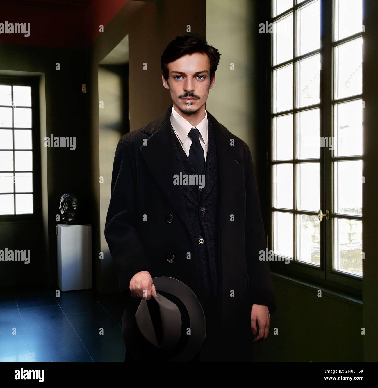 vintage portrait of a man with hat in his hand Stock Photo - Alamy