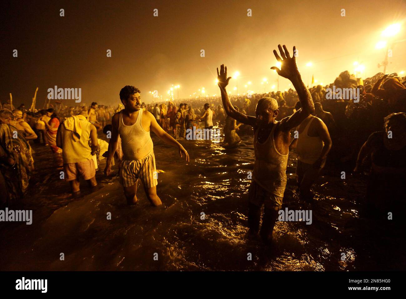 Hindu devotees take a holy dip at "Sangam", the confluence of Hindu ...