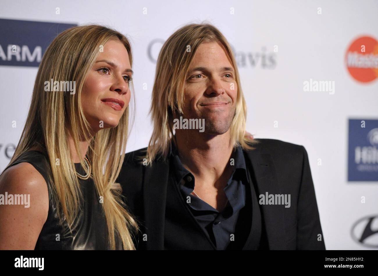Foo Fighters drummer Taylor Hawkins, right, and Alison Hawkins arrives ...