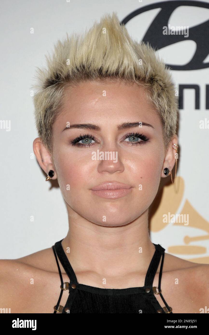 Actress and singer Miley Cyrus arrives at the Clive Davis Pre-GRAMMY ...