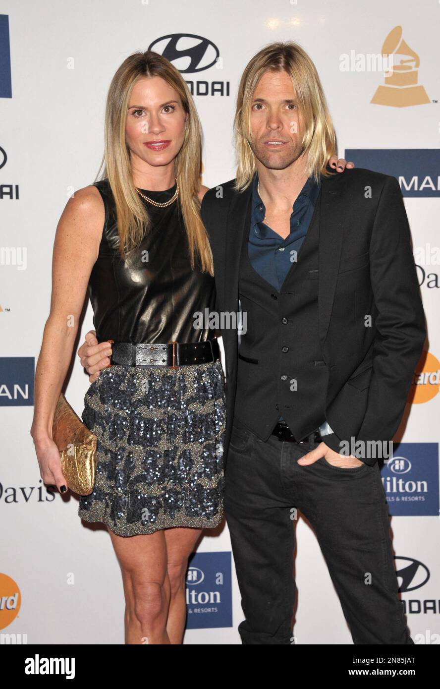 Foo Fighters drummer Taylor Hawkins, right, and Alison Hawkins arrive ...