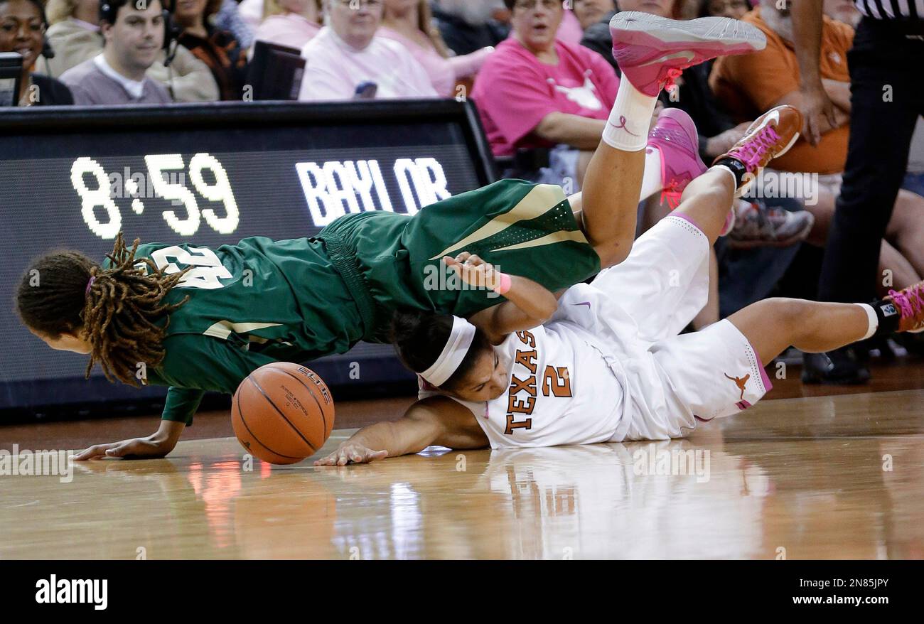 Baylor's Brittney Griner, left, and Texas' Celina Rodrigo (2) scramble ...