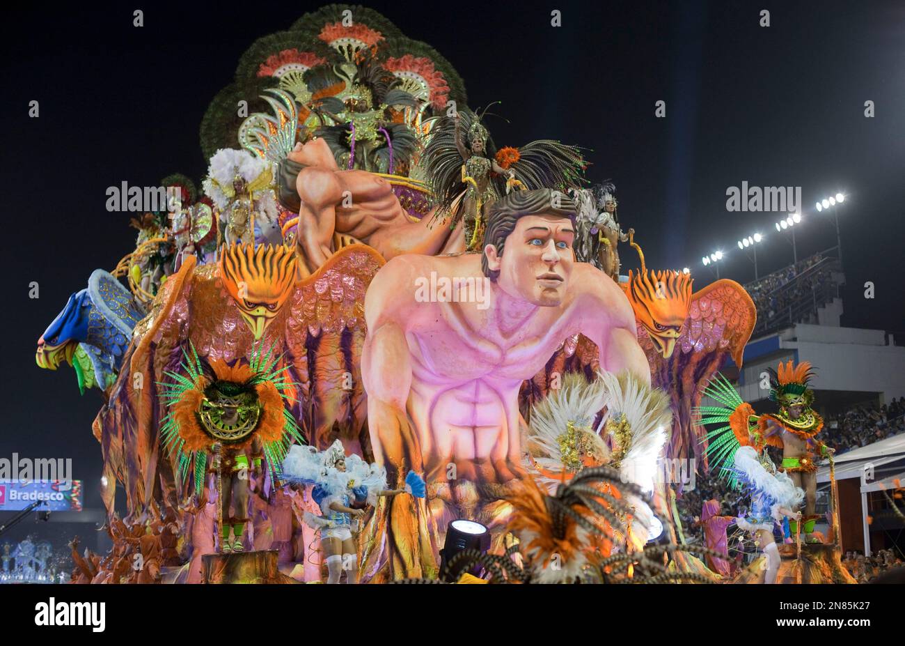 Dancers from the Nene da Vila Matilde samba school perform on a float ...