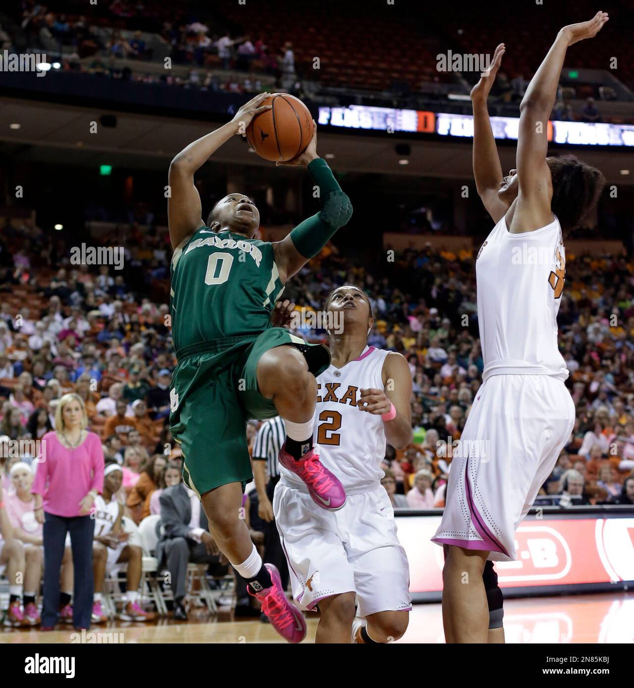 Baylor's Odyssey Sims (0) shoots over Texas' Celina Rodrigo (2) and ...