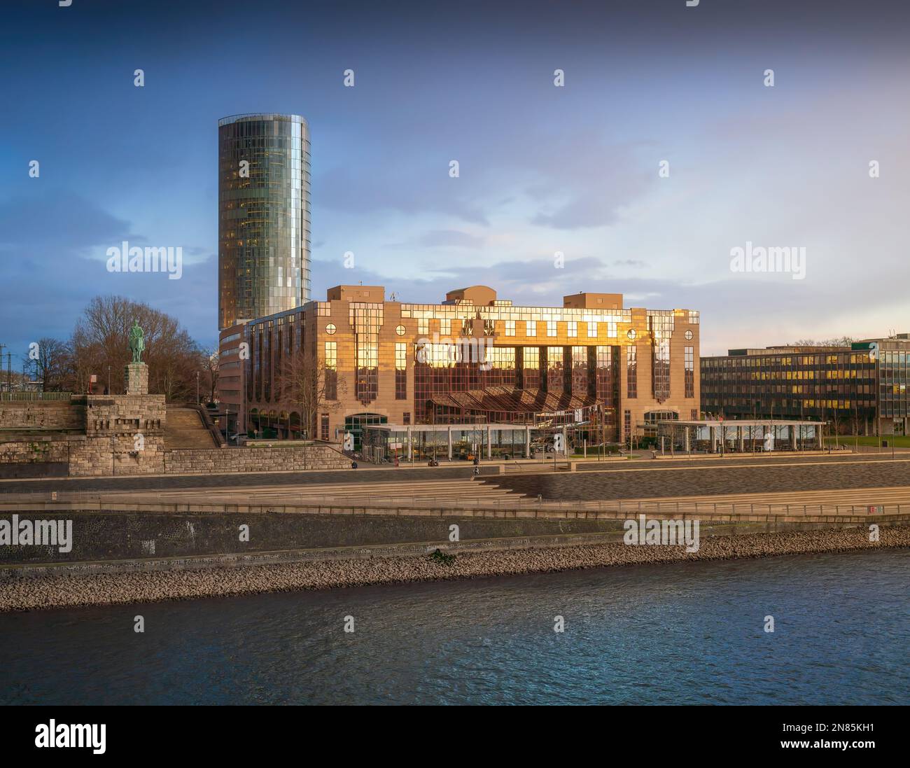 Rhine River skyline at sunset with KolnTriangle Building - Cologne ...