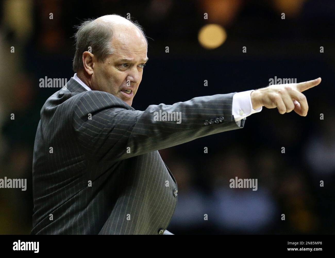 Vanderbilt coach Kevin Stallings motions to his players in the first ...