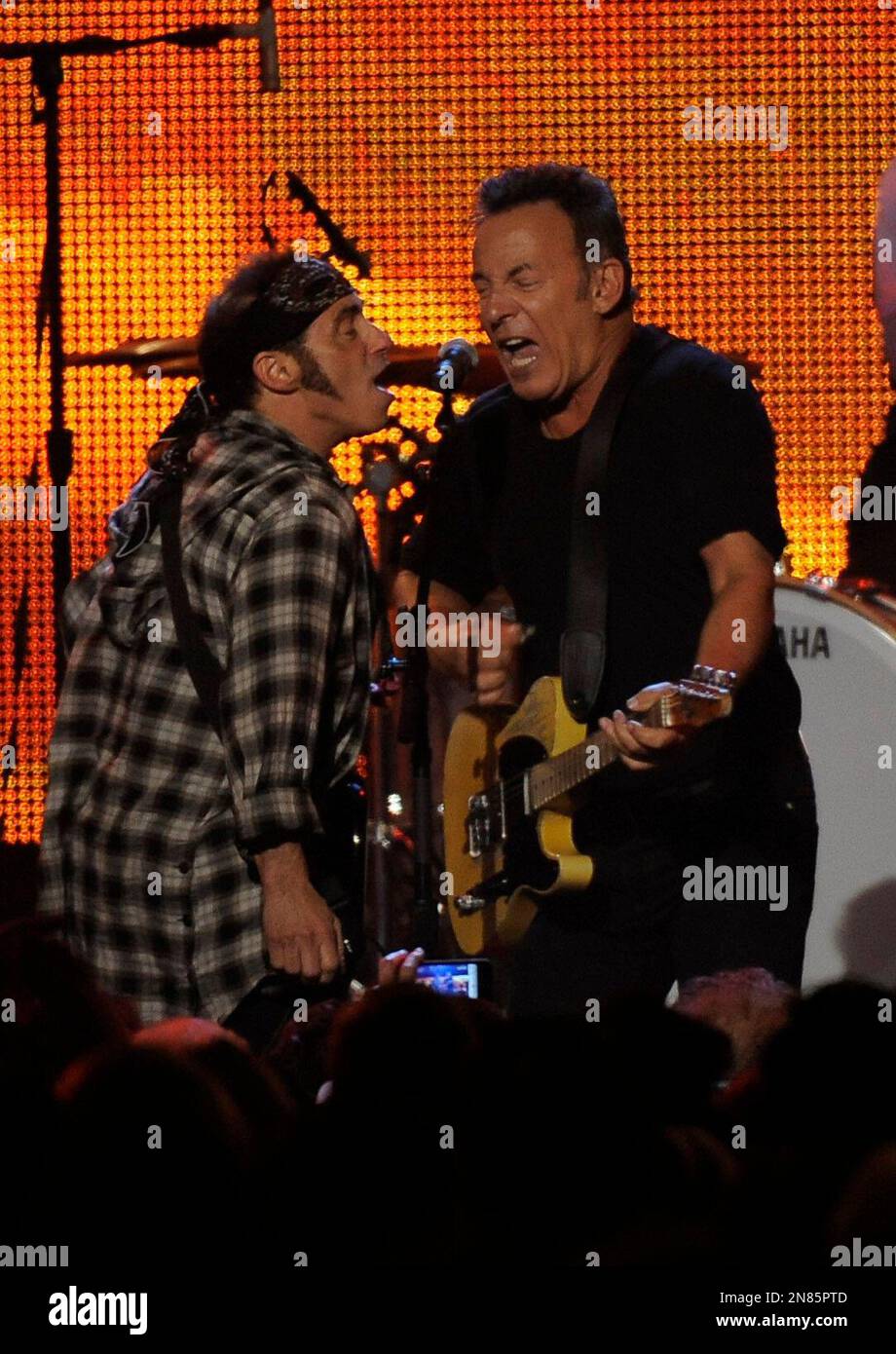 Bruce Springsteen, right, and Nils Lofgren perform at the MusiCares ...