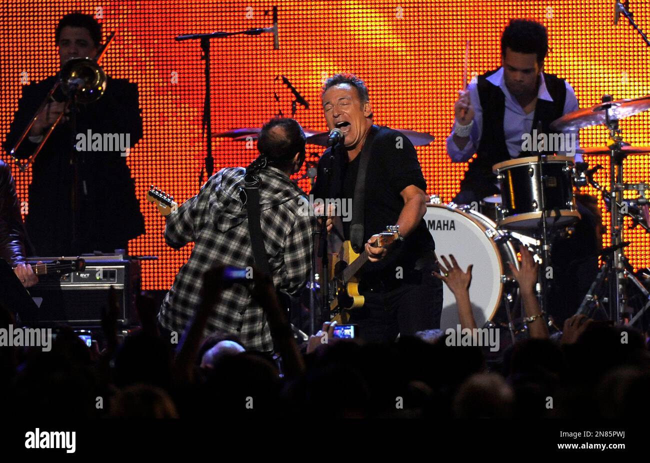 Bruce Springsteen, left, and Nils Lofgren perform at the MusiCares ...