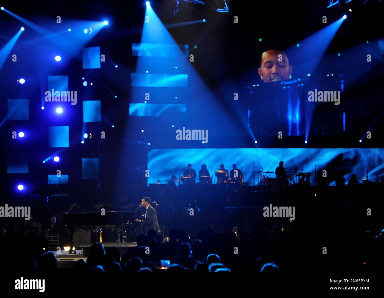 John Legend performs "Dancing in the Dark" on stage at the MusiCares ...