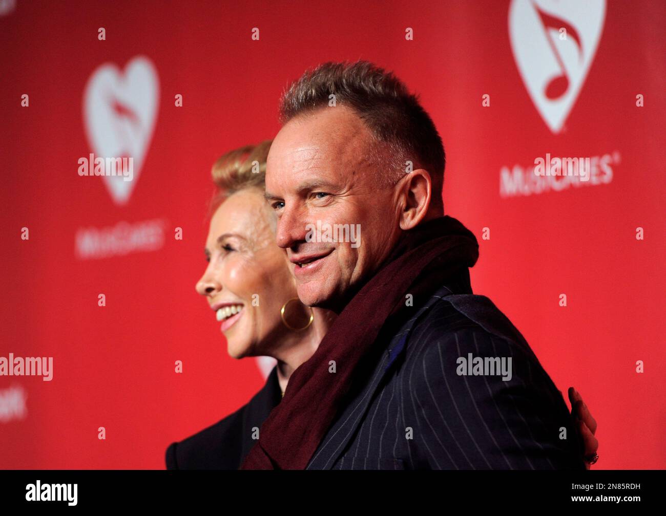 Sting, right, and Trudie Styler arrive at the MusiCares Person of the ...