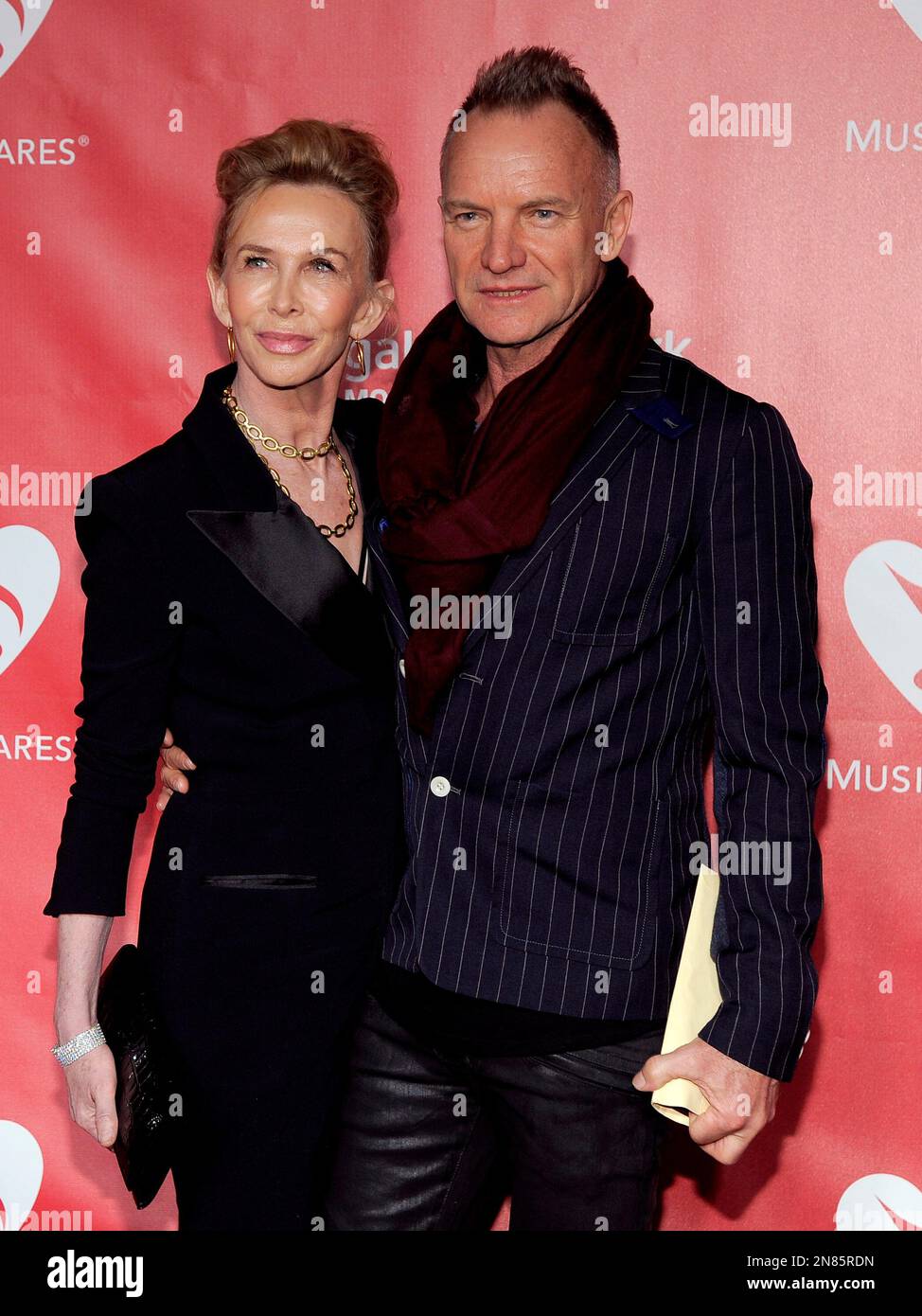 Sting, right, and Trudie Styler arrive at the MusiCares Person of the ...