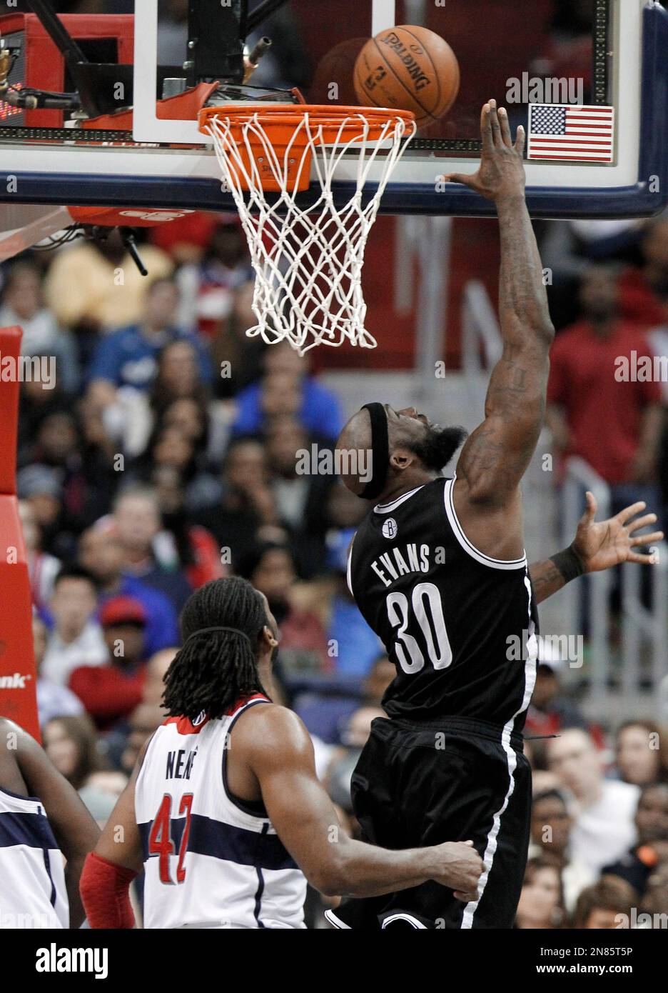Brooklyn Nets forward Reggie Evans (30) shoots in front of Washington ...