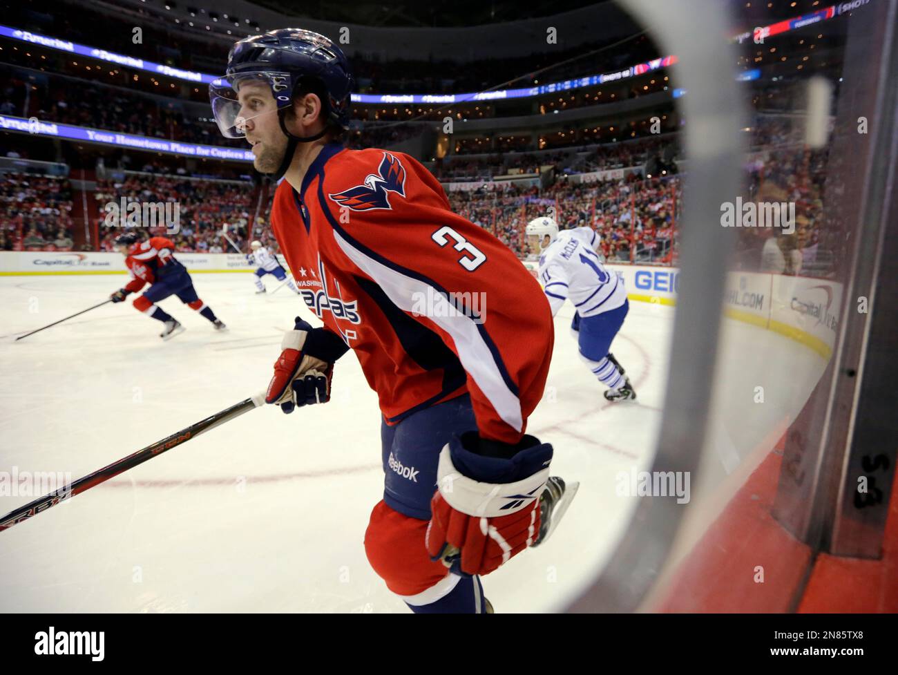 Washington Capitals defenseman Tom Poti (3) skates on the ice in the ...