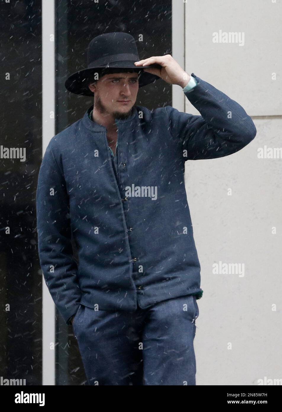 An Amish man leaves U.S. Federal courthouse Friday, Feb. 8, 2013, in ...