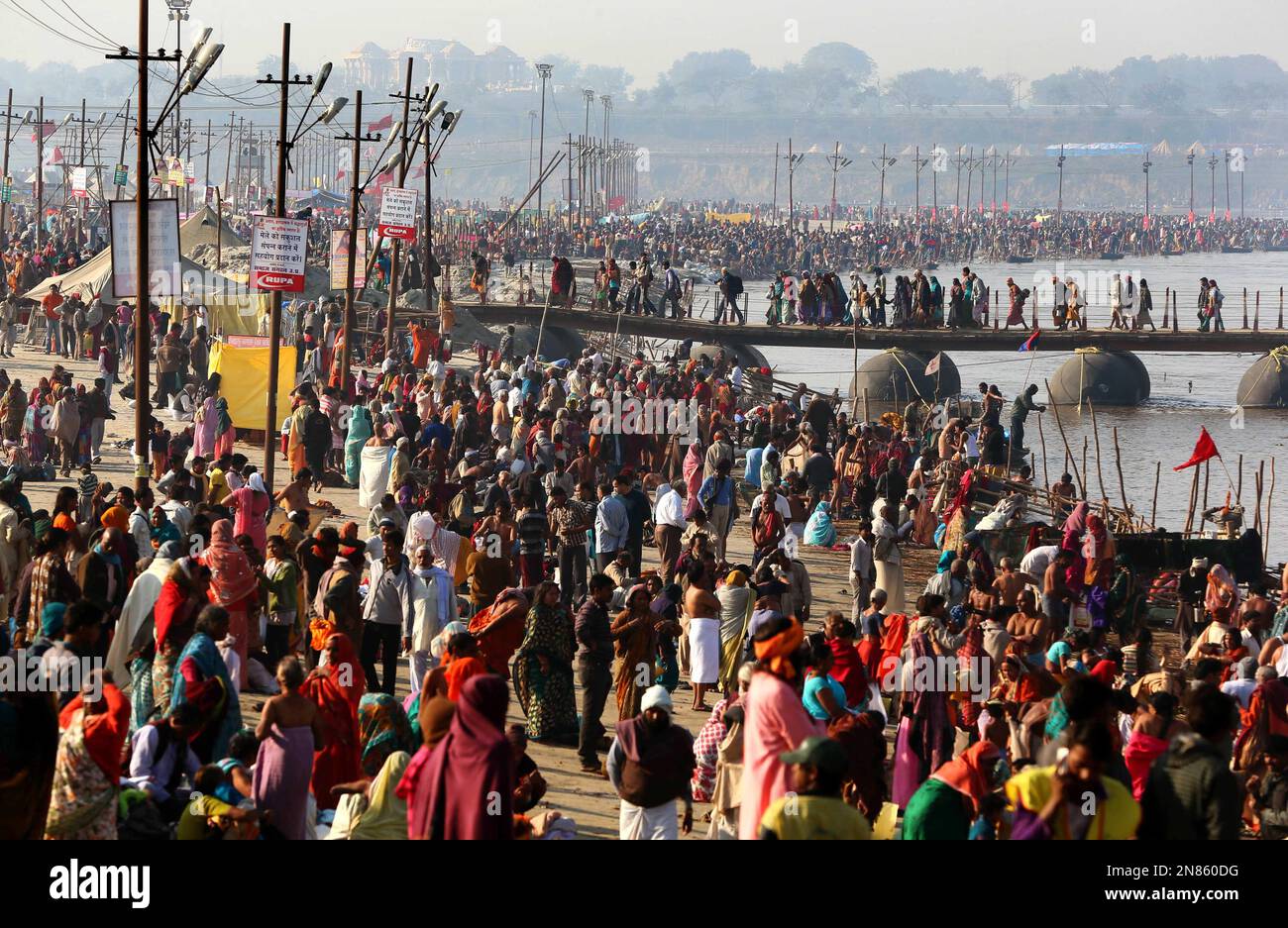 Thousand of Hindu devotees arrive for a dip at Sangam, the confluence ...