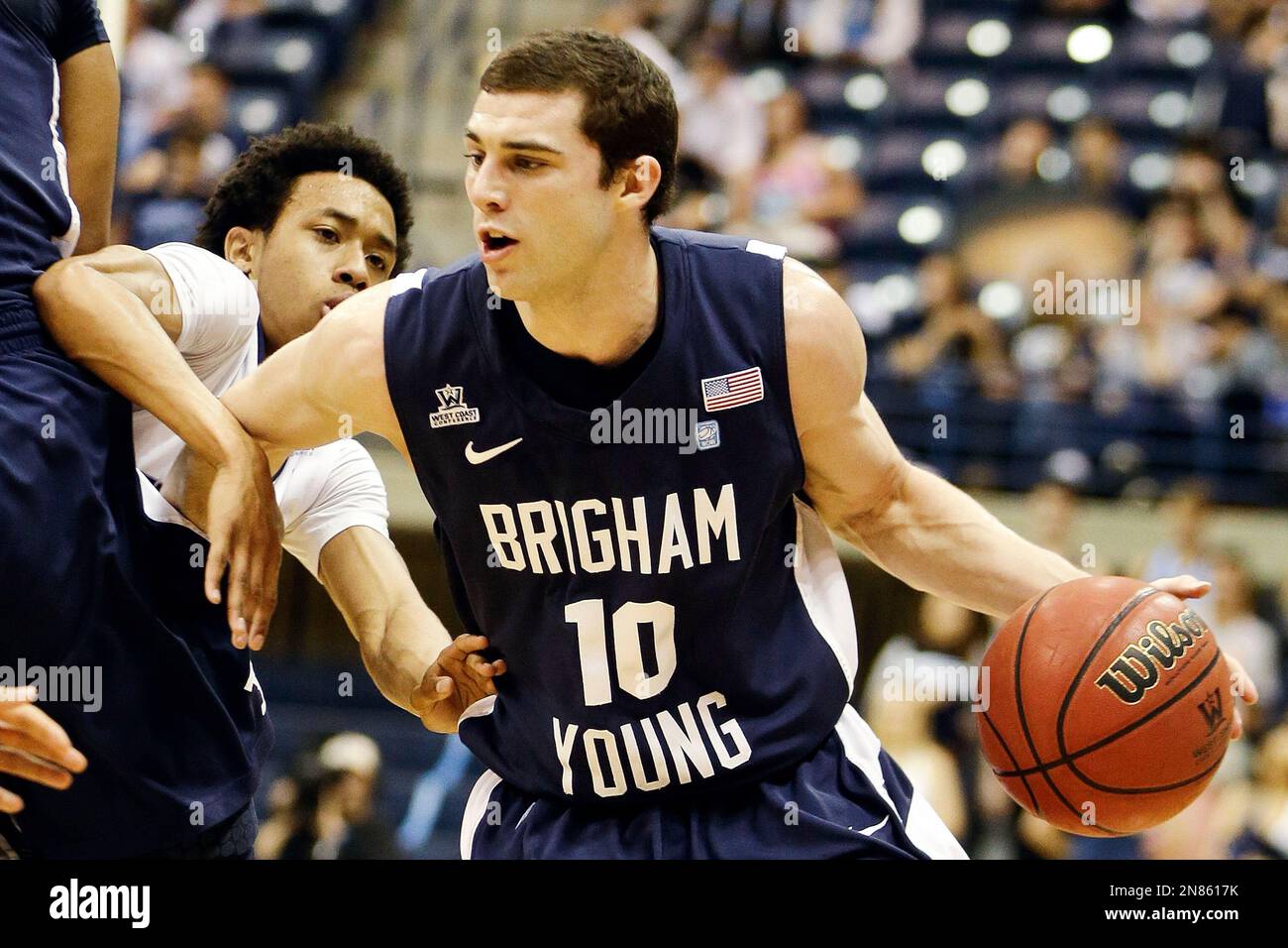 Brigham Young guard Matt Carlino drives the lane against San Diego ...