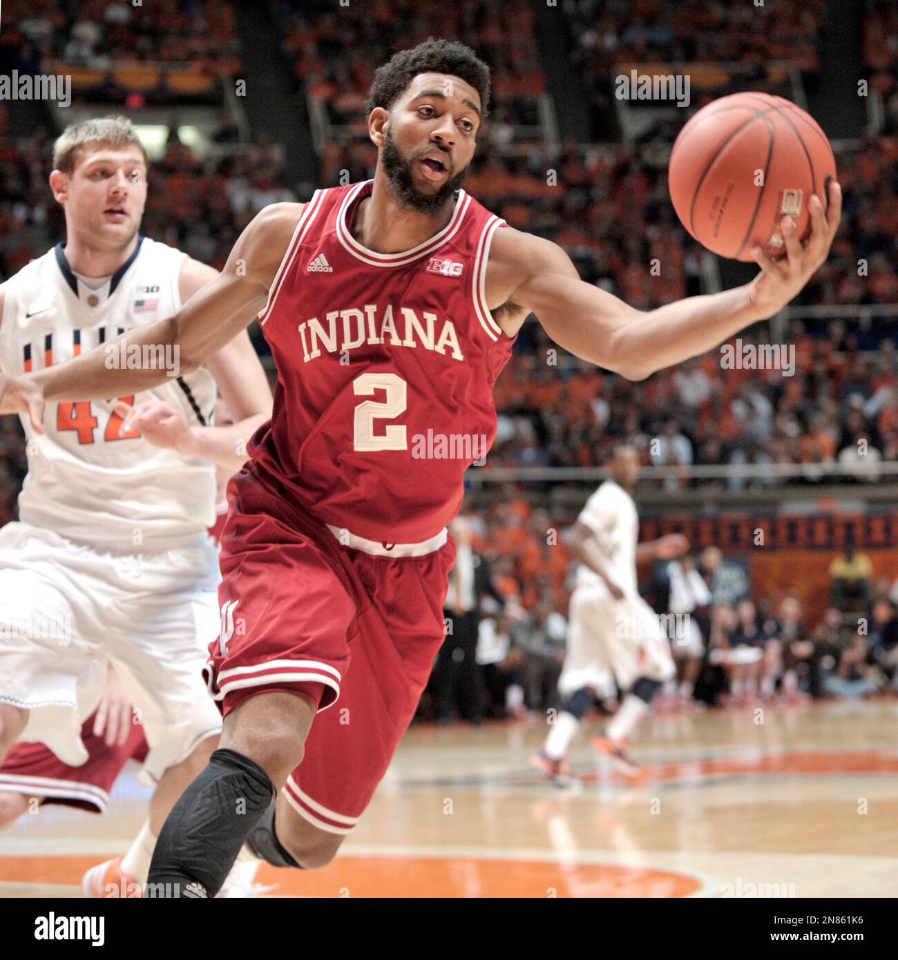 Indiana's Christian Watford (2) grabs a rebound in front of Illinois ...