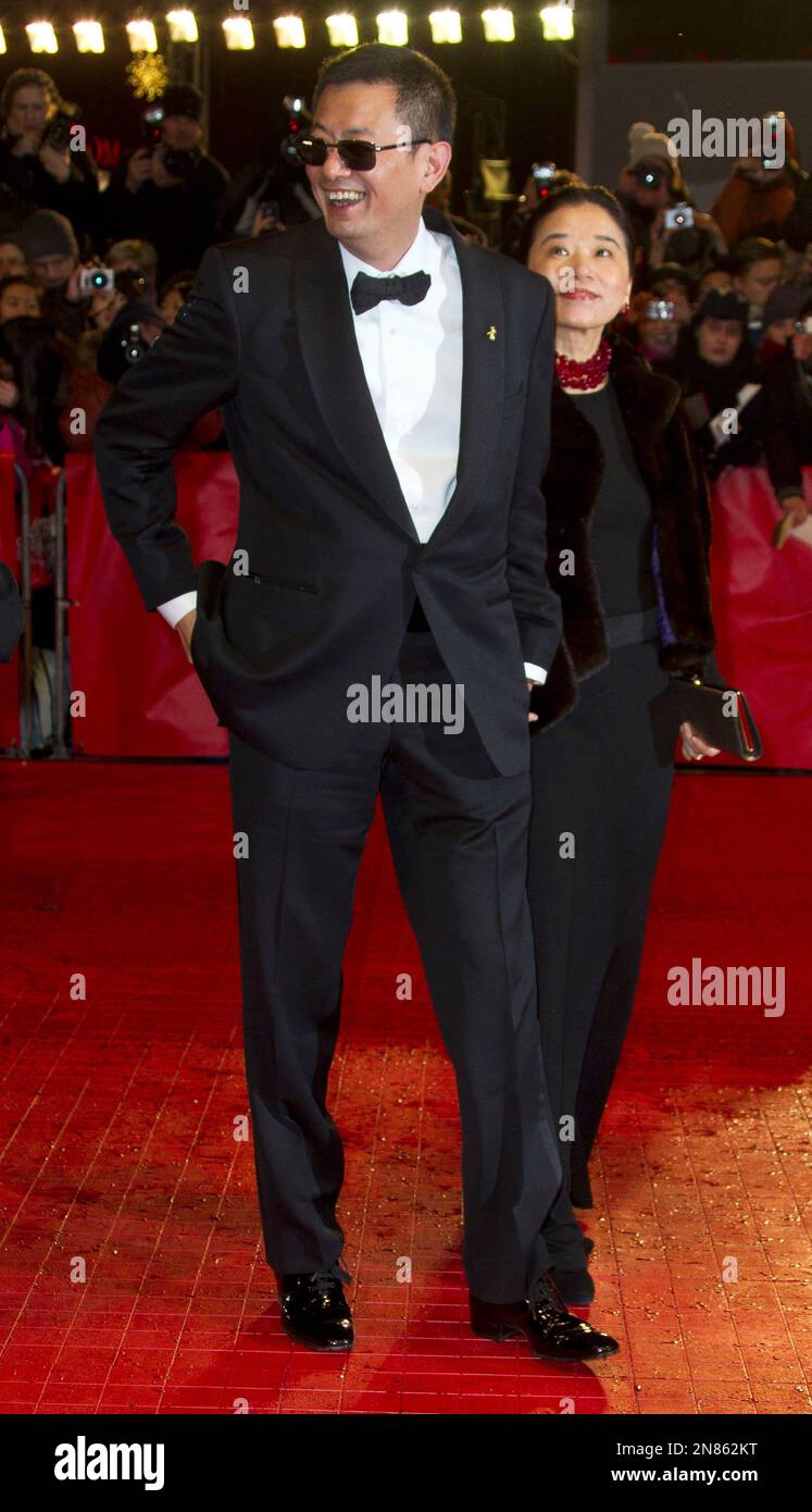 Director Wong Kar Wai and wife Esther Wong arrive on the red carpet for ...