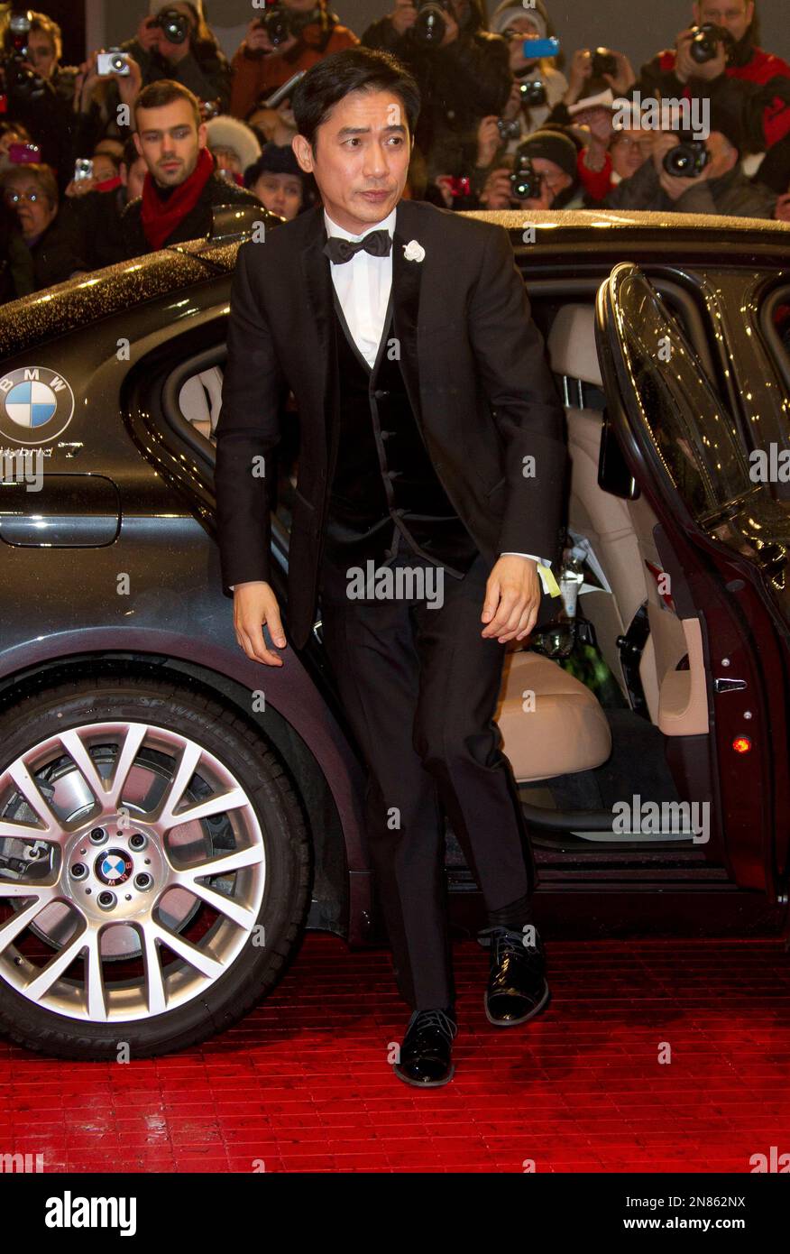 Actor Tony Leung arrives on the red carpet for the screening of the ...