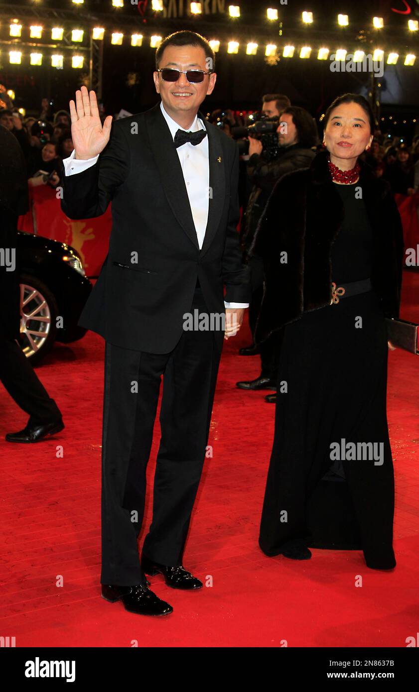 Director Wong Kar Wai and wife Esther Wong arrive on the red carpet for ...