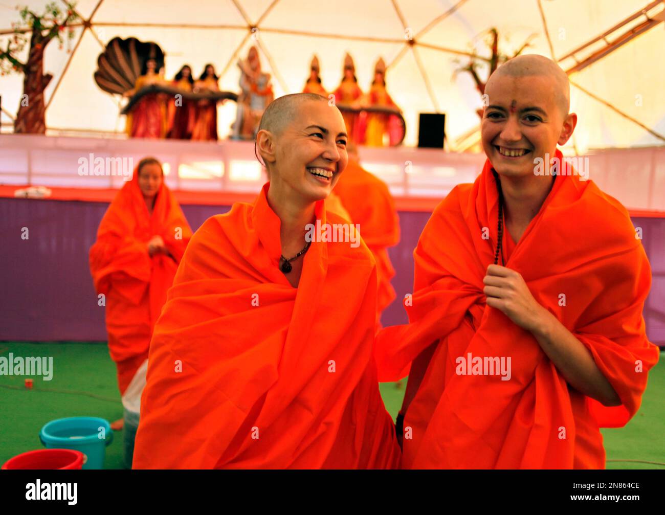 Women foreign devotees talk after their consecration ceremony for ...