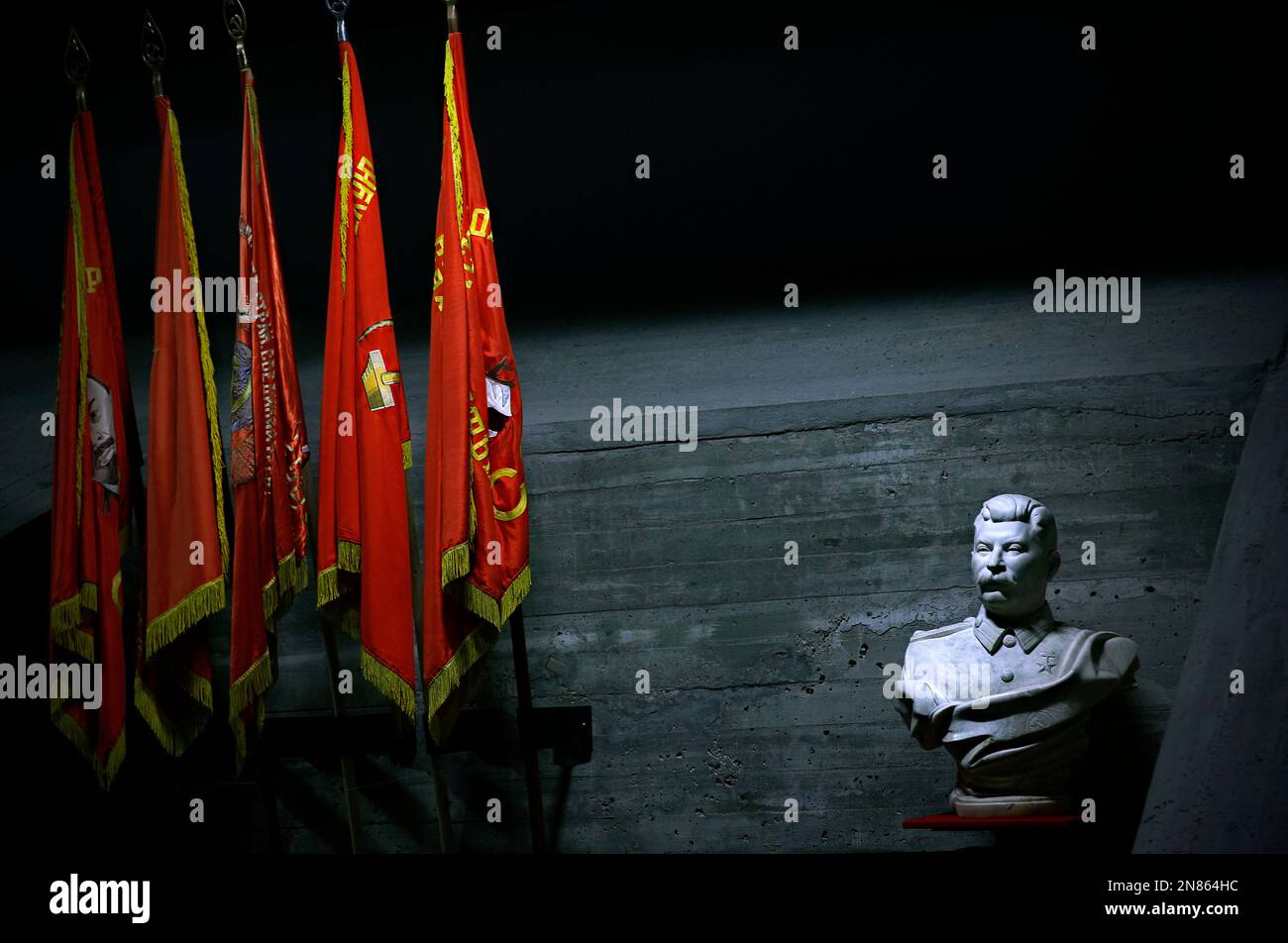 The bust of Soviet dictator Josef Stalin, right, and the Red Army ...