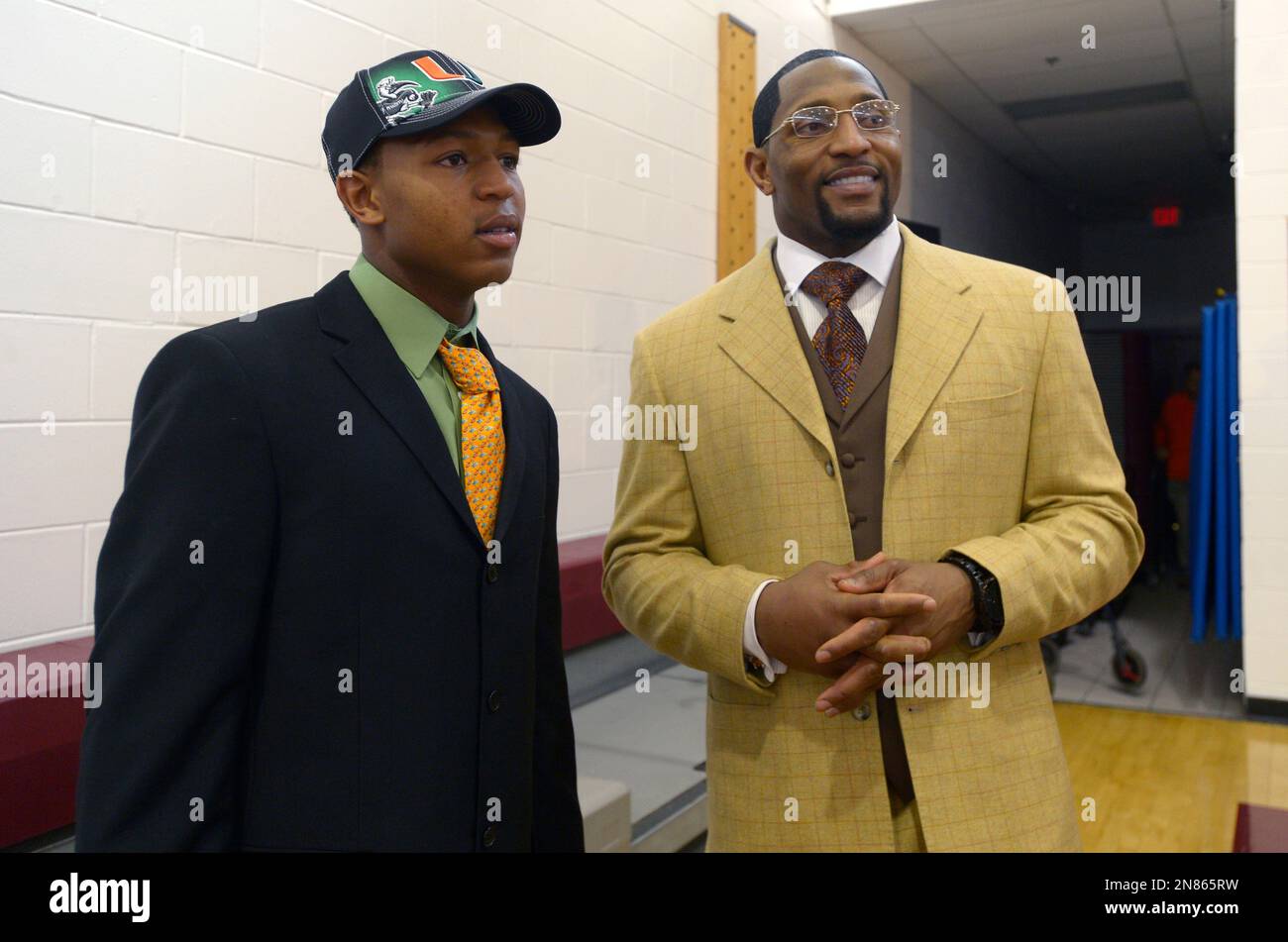 Ray Lewis III, left, and his father, former Baltimore Ravens linebacker ...