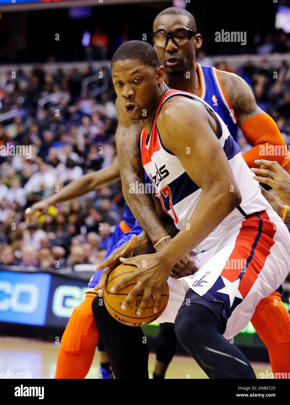 New York Knicks forward Amare Stoudemire (1) reaches for the ball held ...