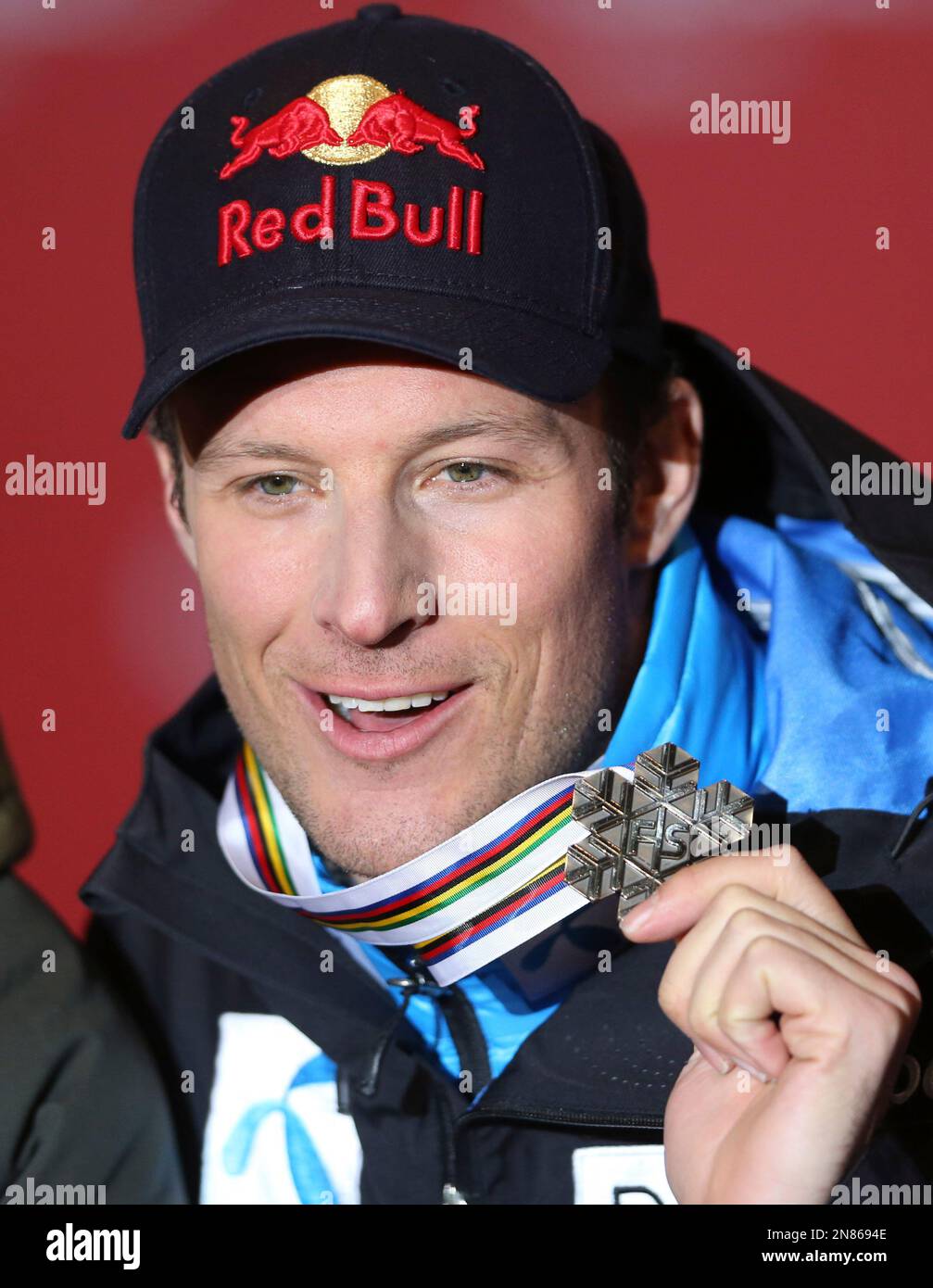 Norway's Aksel Lund Svindal shows the bronze medal he won on the podium ...