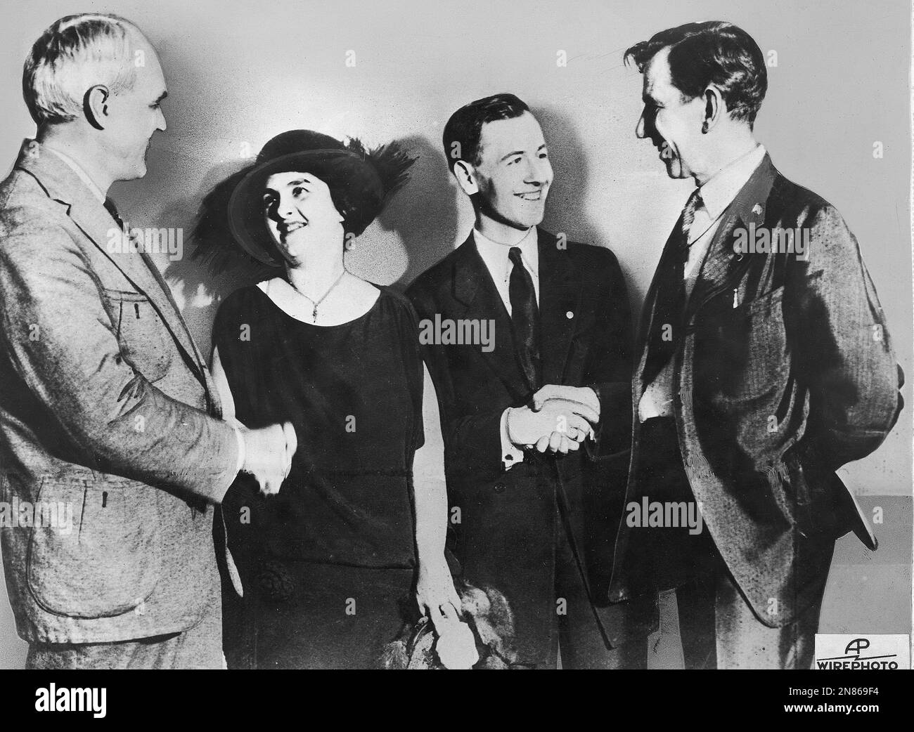Mary Frances Creighton and her husband John, both at center, thank ...