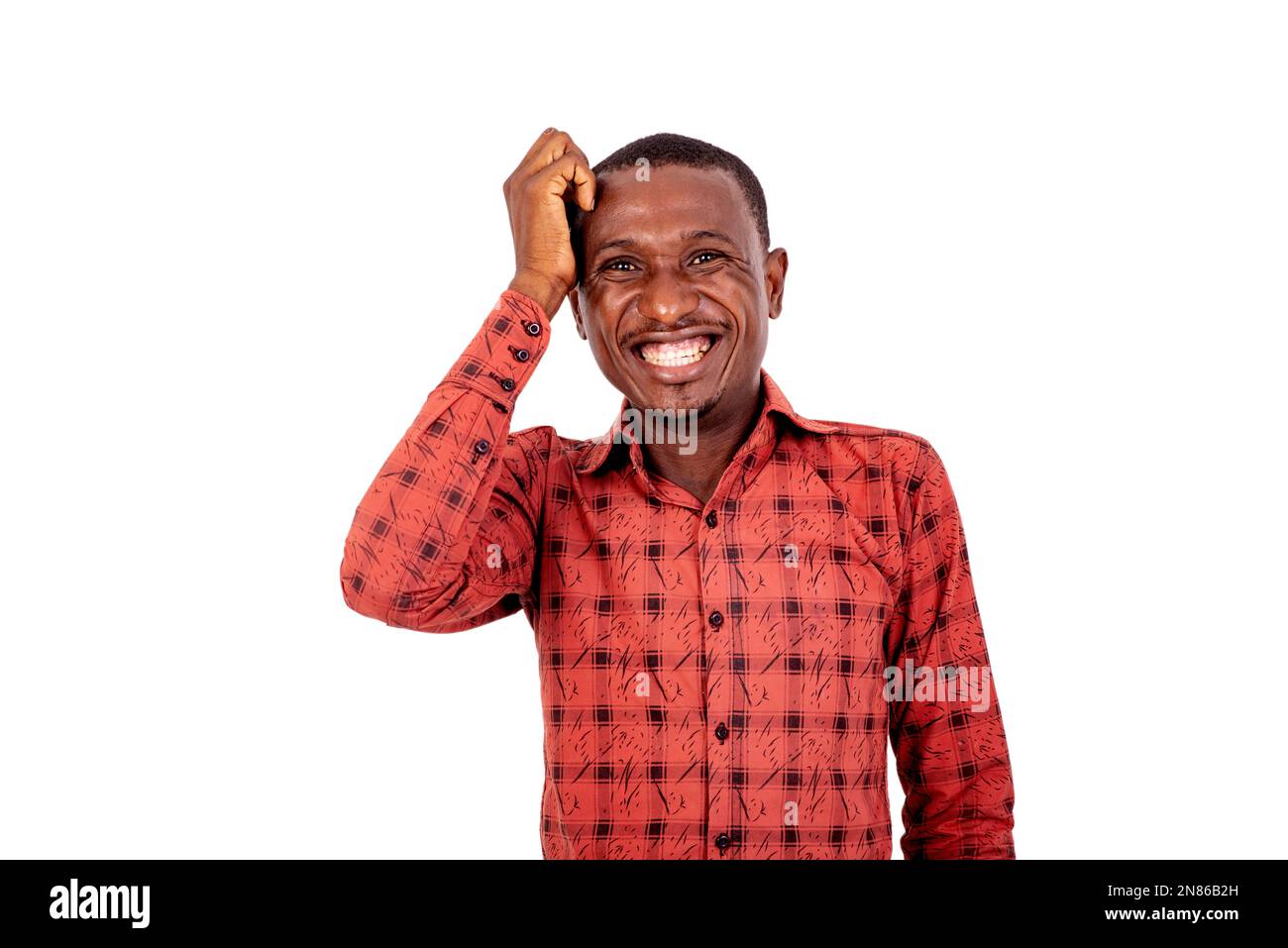 Laughing and scratching his head hi-res stock photography and images ...