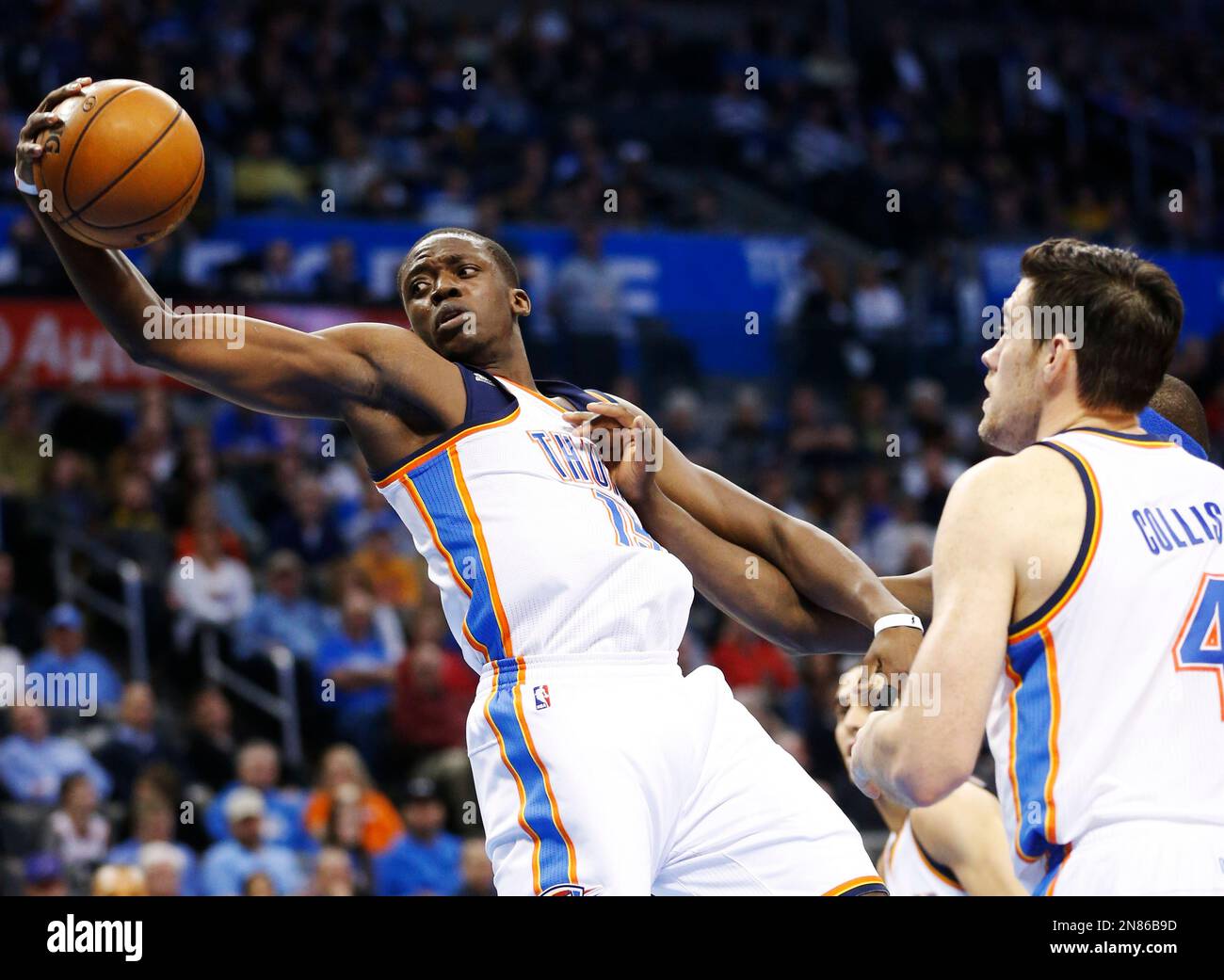 Oklahoma City Thunder guard Reggie Jackson (15) grabs a rebound in ...