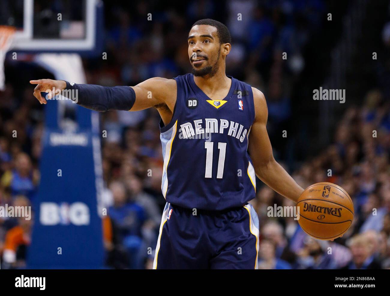 Memphis Grizzlies guard Mike Conley directs his team during an NBA ...