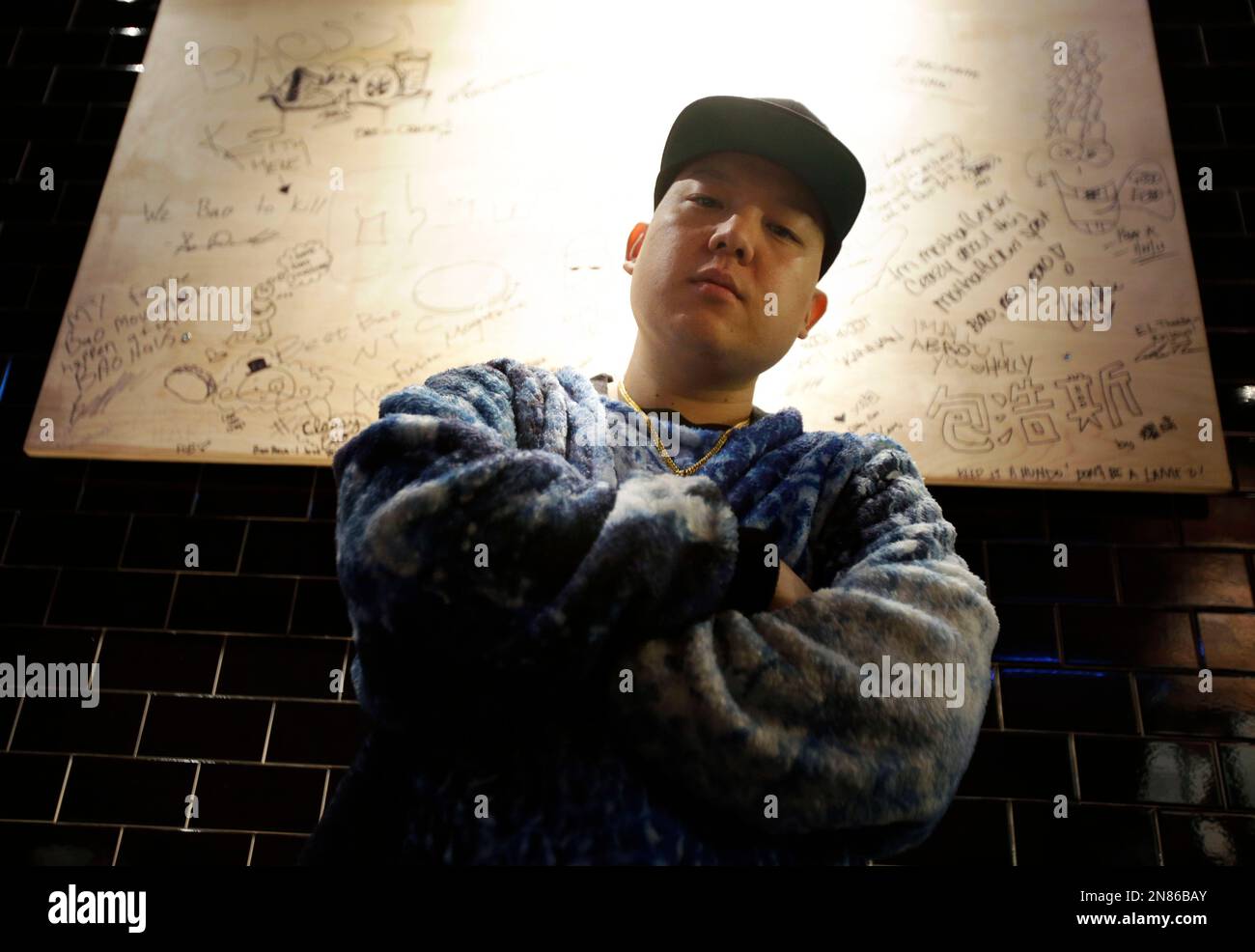 In this Monday, Jan. 28, 2013 photo, Eddie Huang poses for a picture at ...
