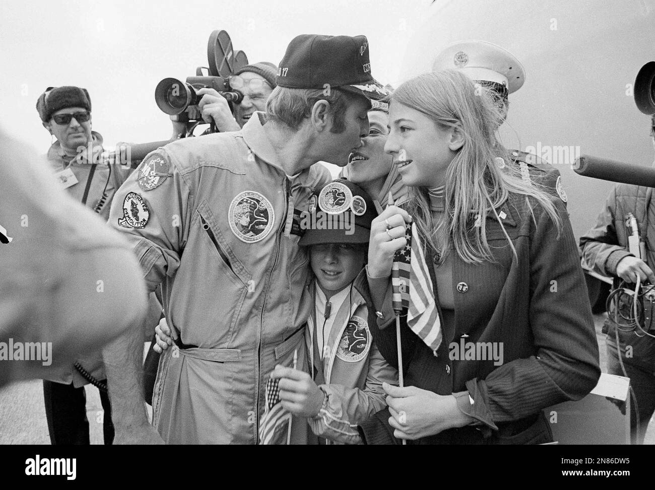 Apollo 17 command module pilot, Ronald E. Evans, is greeted by his ...