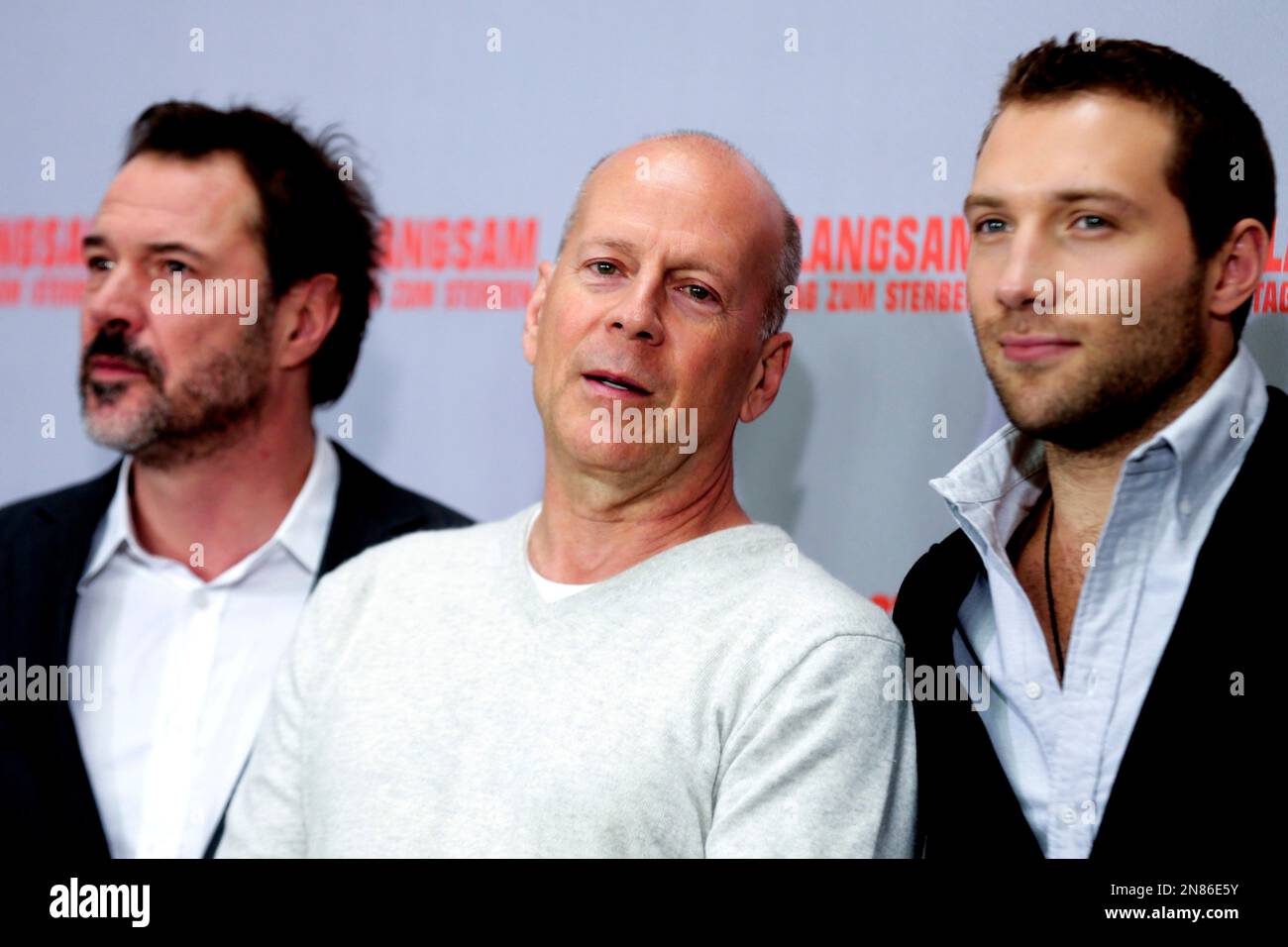 US actor Bruce Willis, center, German actor Sebastian Koch, left, and ...