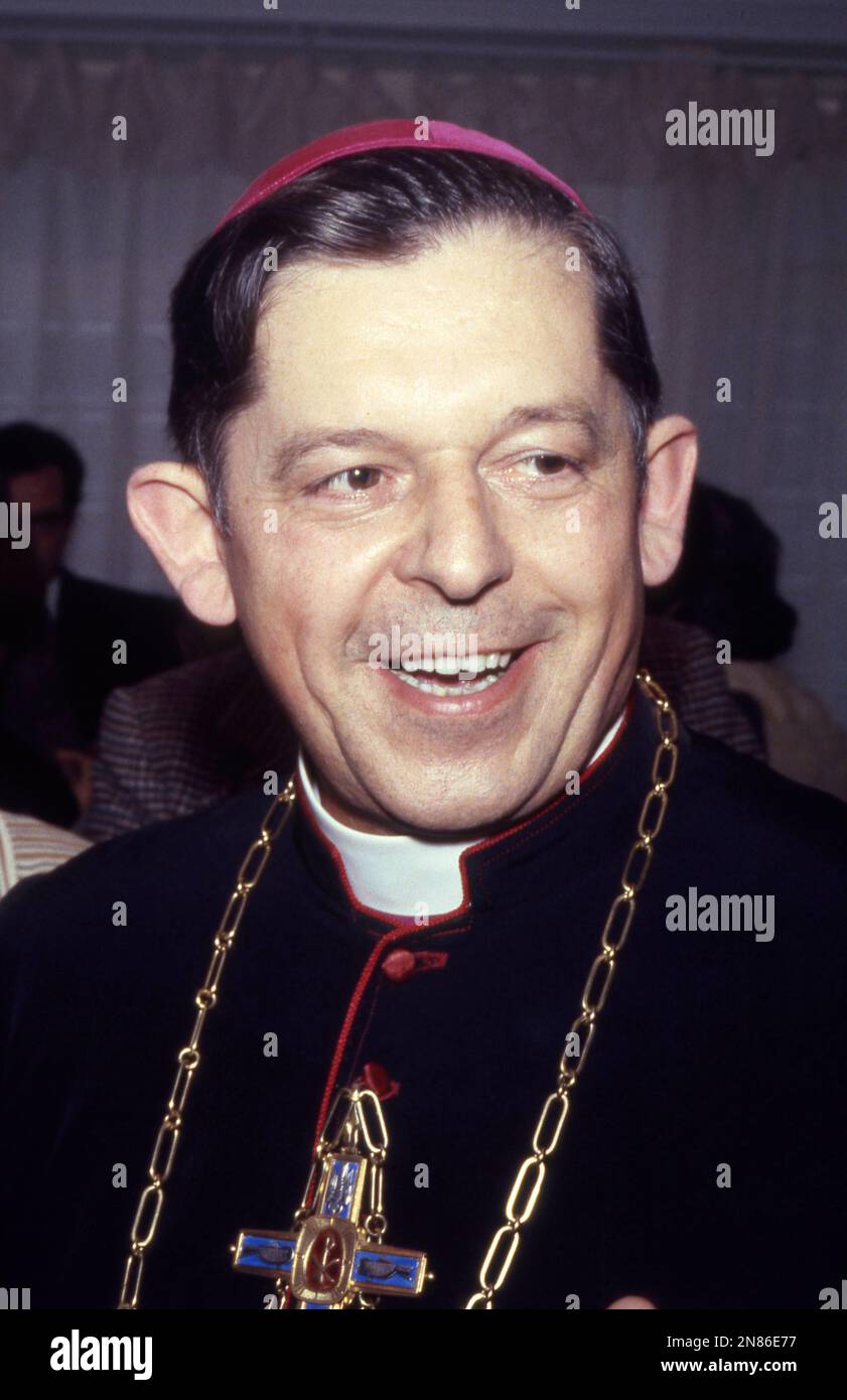 Poland's Primate, Archbishop Jozef Glemp smiles during a brief visit to ...