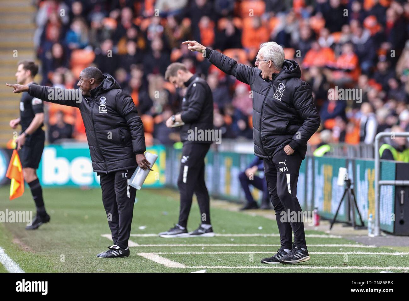 Mick McCarthy manager of Blackpool gives his team instructions during ...