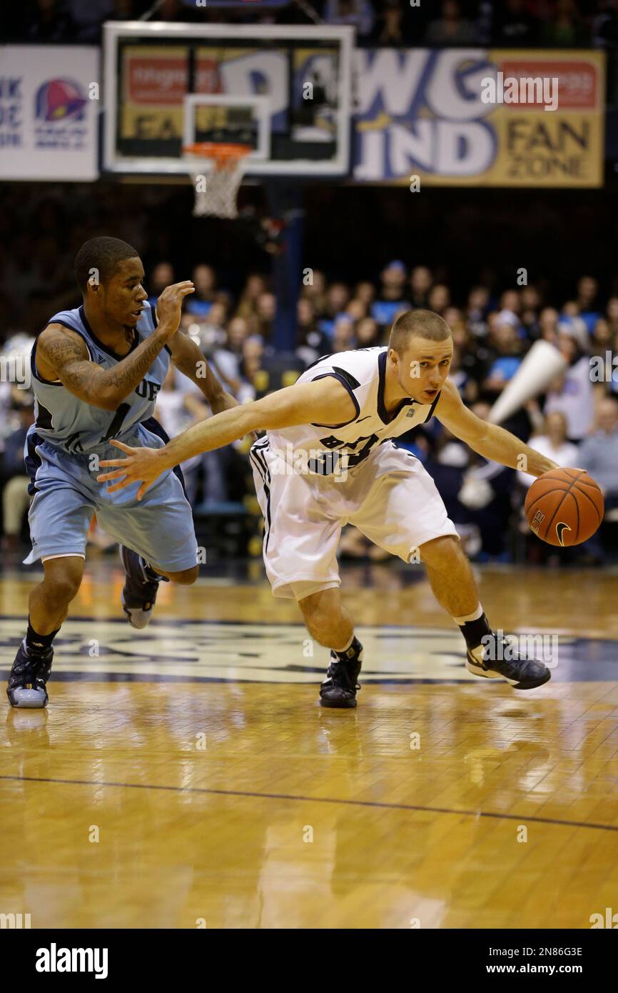 Butler guard Chase Stigall, right, gets bast Rhode Island guard Mike ...