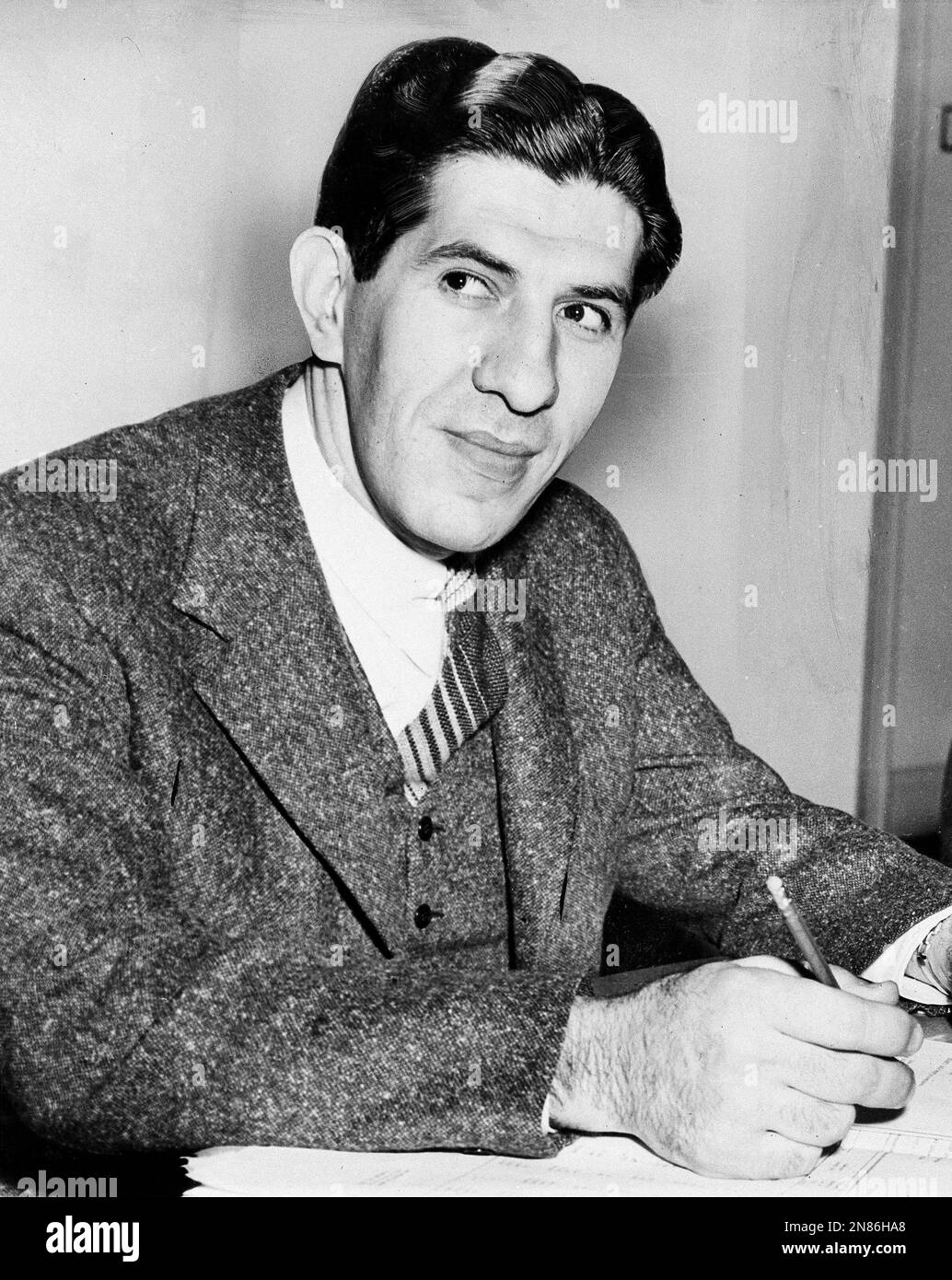 Economist Robert Nathan, chief of requirements of OPM, is shown Feb. 19 ...