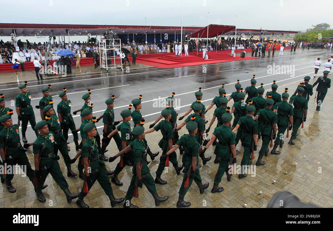 Sri Lankan Army soldiers march during a parade on Sri Lanka's 65th ...