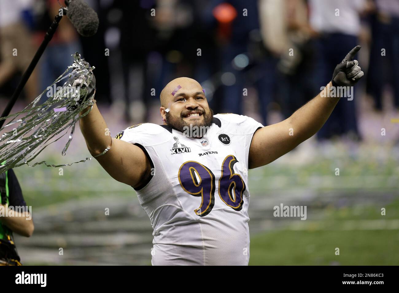 Baltimore Ravens nose tackle Ma'ake Kemoeatu (96) celebrates after ...